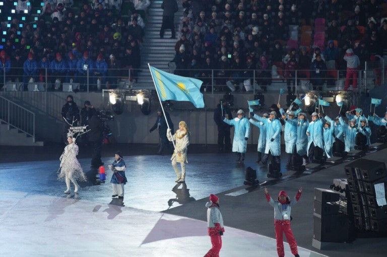 Kazakh short-track skater carries flag at Olympics opening ceremony ...